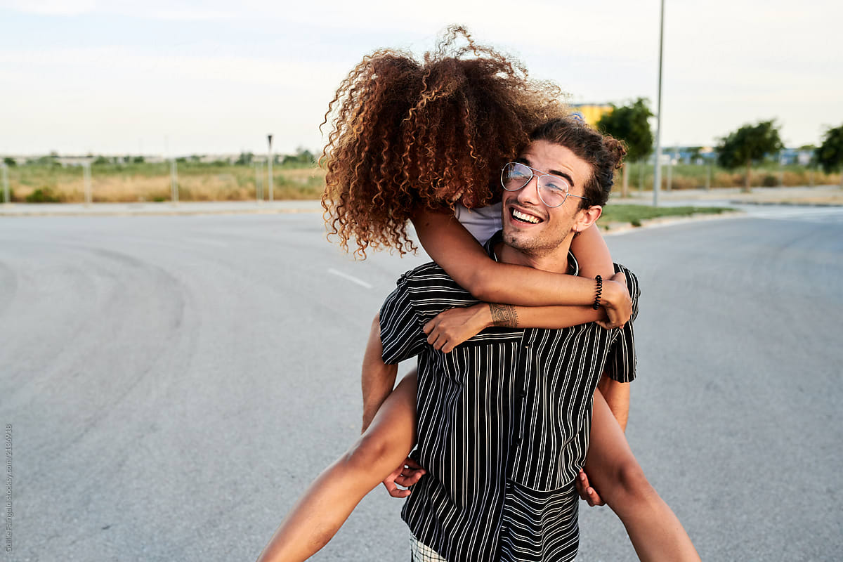 "Smiling Man In Sunglasses Giving Piggy Back." by Stocksy Contributor ...