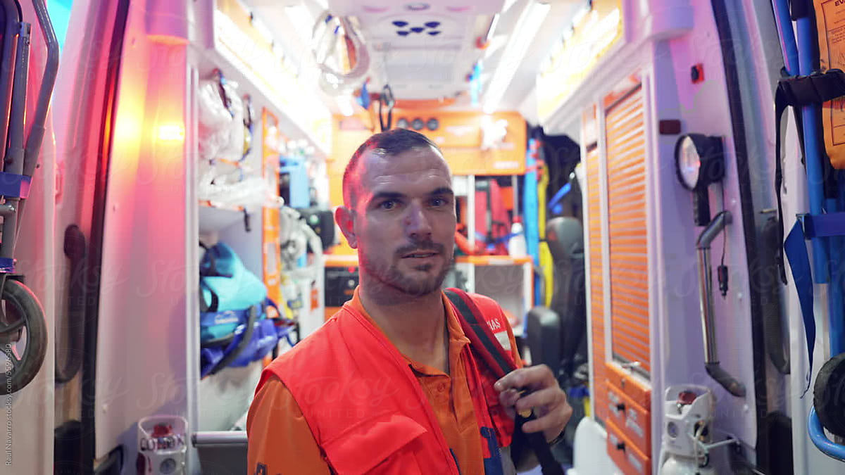 "Paramedic Working On An Ambulance At Night" by Stocksy Contributor ...