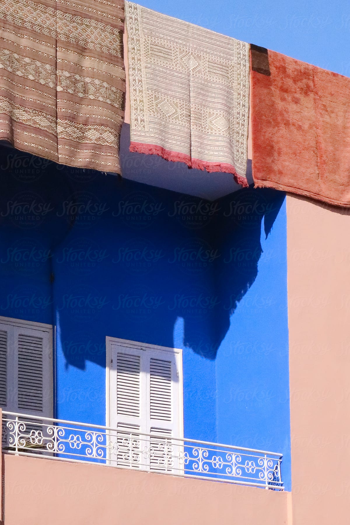 "Carpet On The Roof" by Stocksy Contributor "Jose Coello" - Stocksy