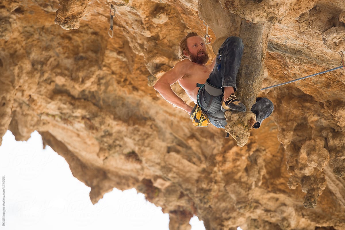 "Portrait Of Man Rock Climber Hanging On Stalactite" by Stocksy ...