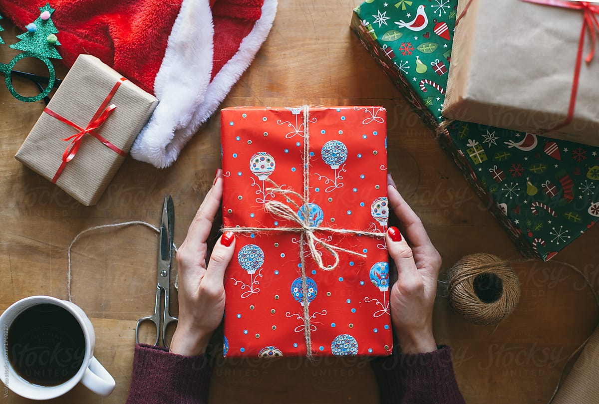 "Woman Wrapping Christmas Presents Indoor" by Stocksy Contributor ...