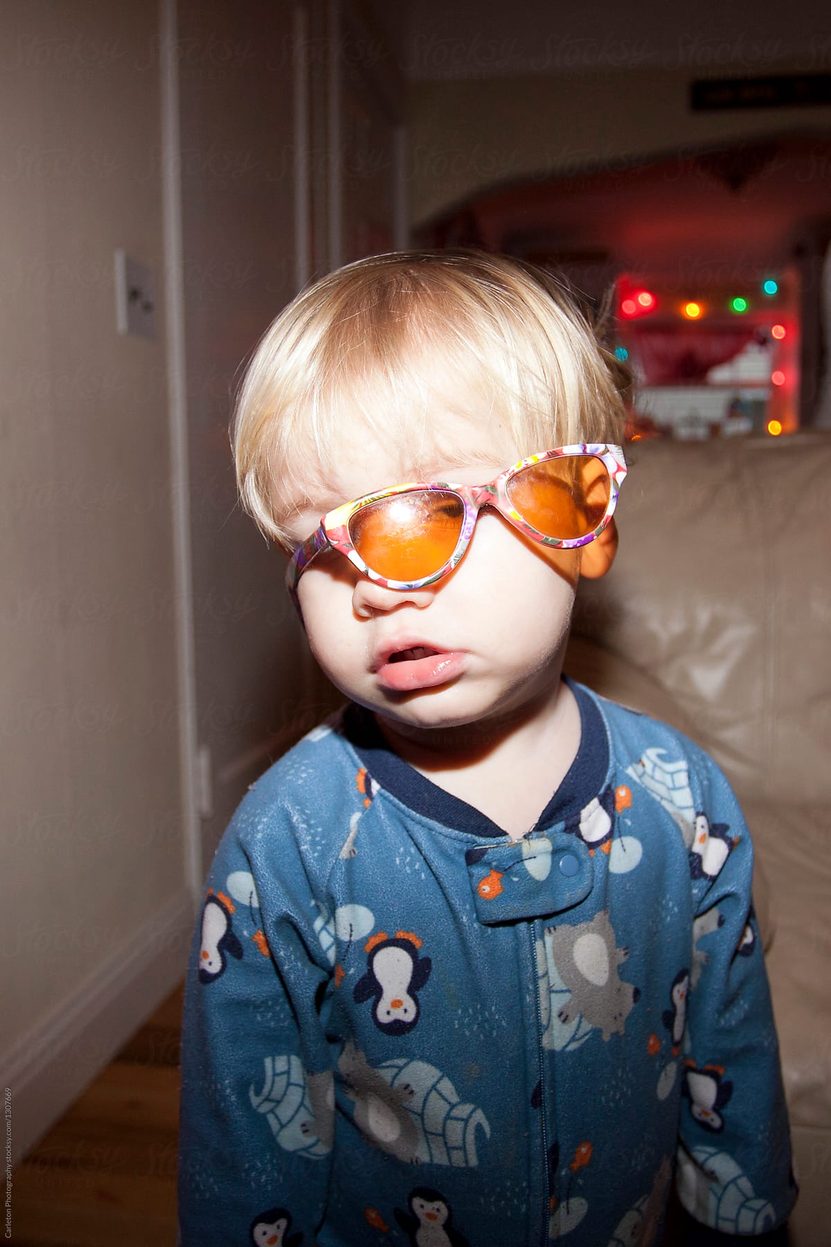 Toddler In Onesie Pajamas Shows Off His New Sunglasses In Hilarious Toddler In Onesie Pajamas Shows Off His New Sunglasses In Hilarious