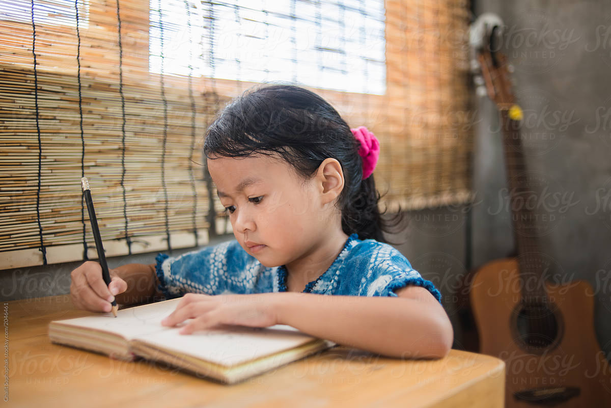 "Asian Children Drawing" by Stocksy Contributor "Chalit Saphaphak ...