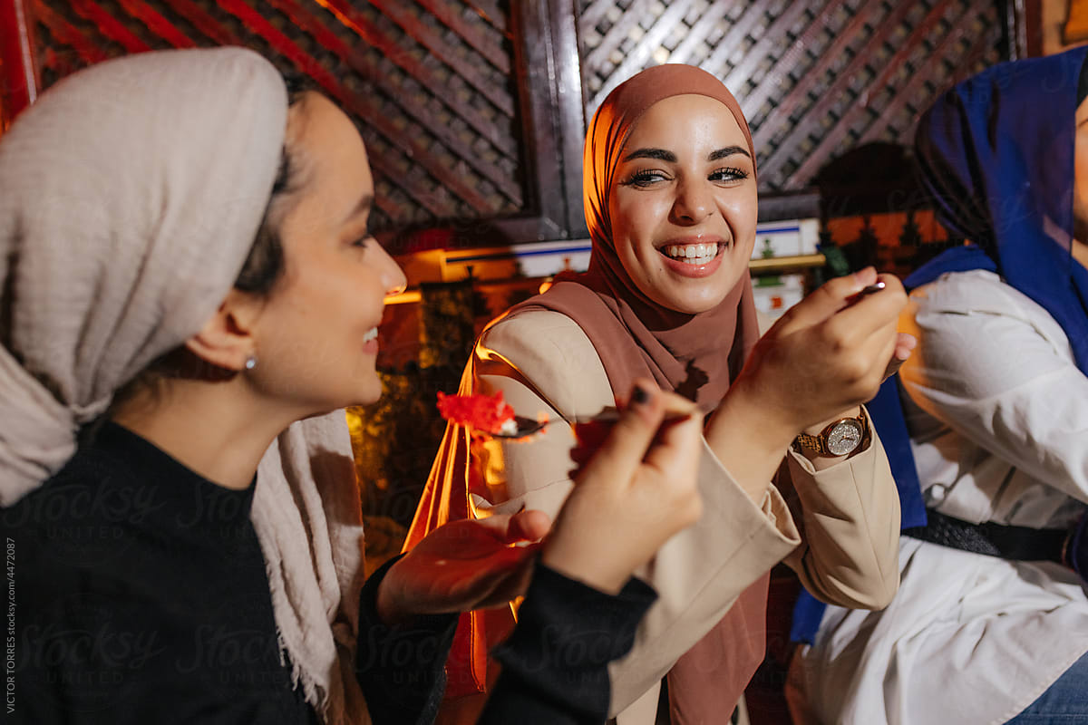 "Happy Muslim Women In Hijab Eating Red Velvet Cakes In Tea House" by ...
