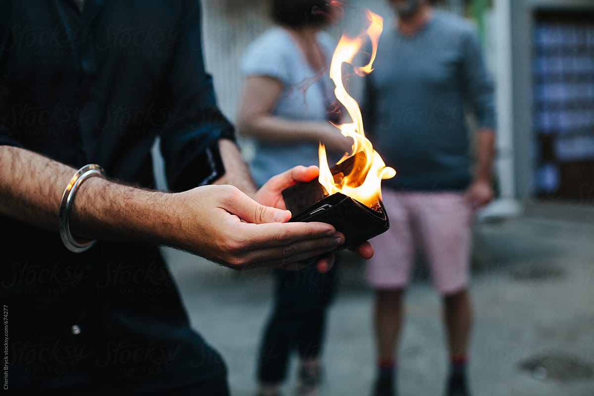 Wallet in fire! - Stock Image - Everypixel