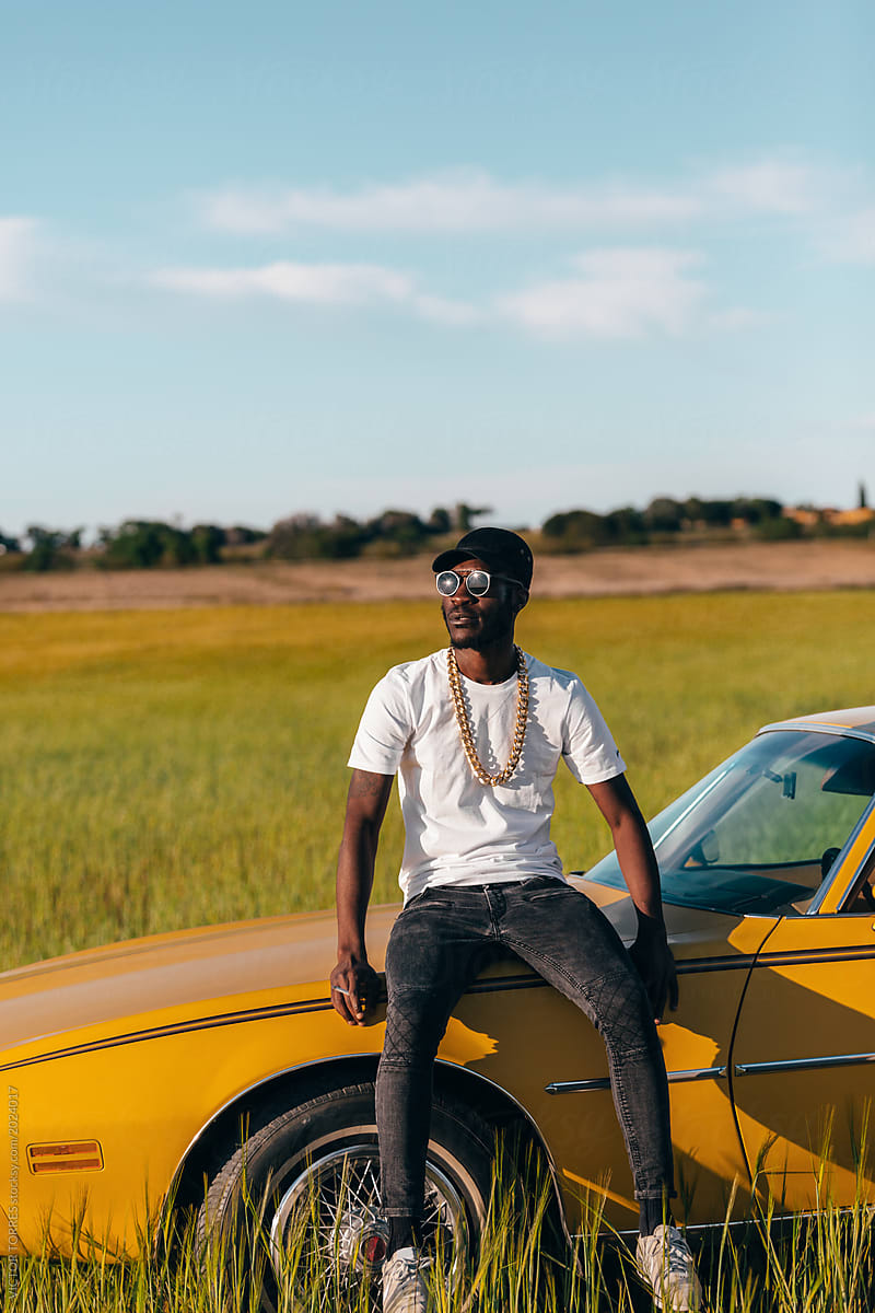 "Black African Man Besides A Classic Car Waiting For Assitance" by ...