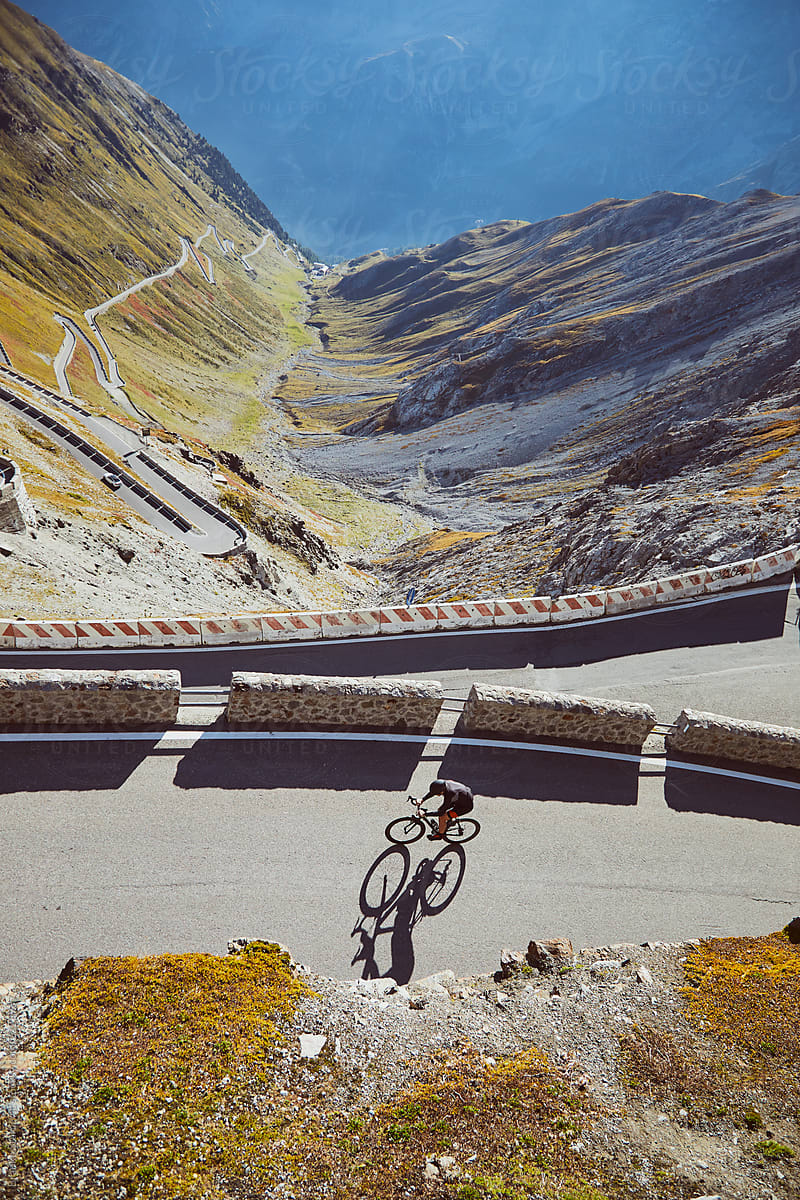 "Cyclist Climbing In Alps." by Stocksy Contributor "Branko Starcevic ...