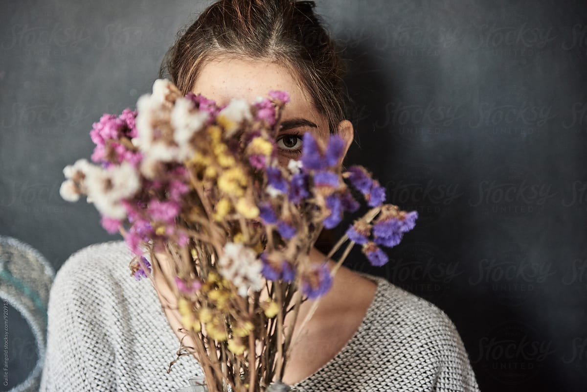 "Young Woman Behind The Bunch Of Flowers" by Stocksy Contributor ...