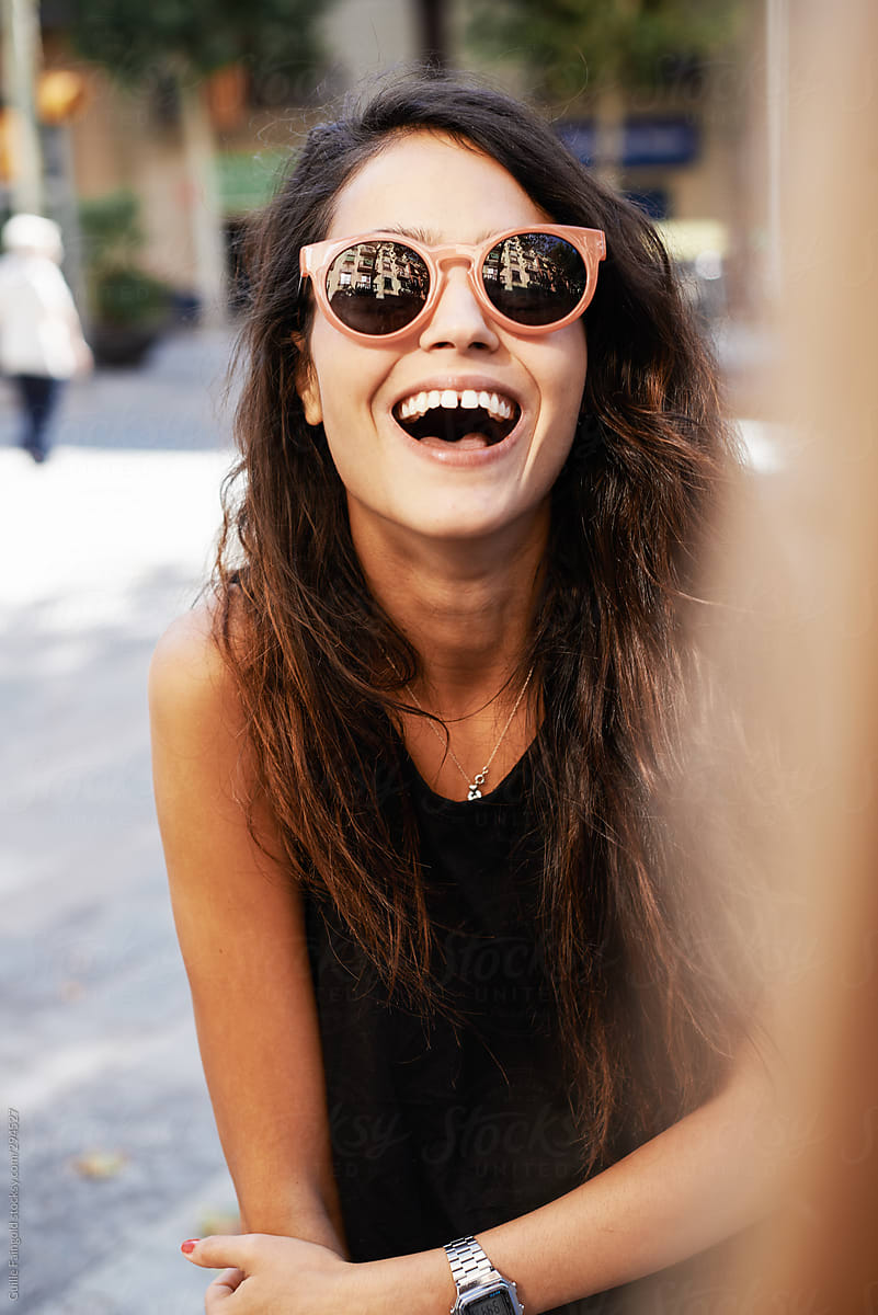 "Laughing" by Stocksy Contributor "Guille Faingold" - Stocksy
