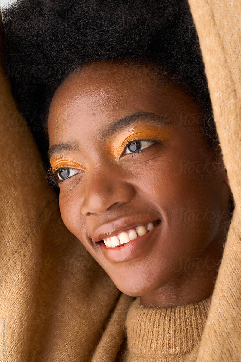 "Eyeshadow Gloss Smile" by Stocksy Contributor "Juno" - Stocksy
