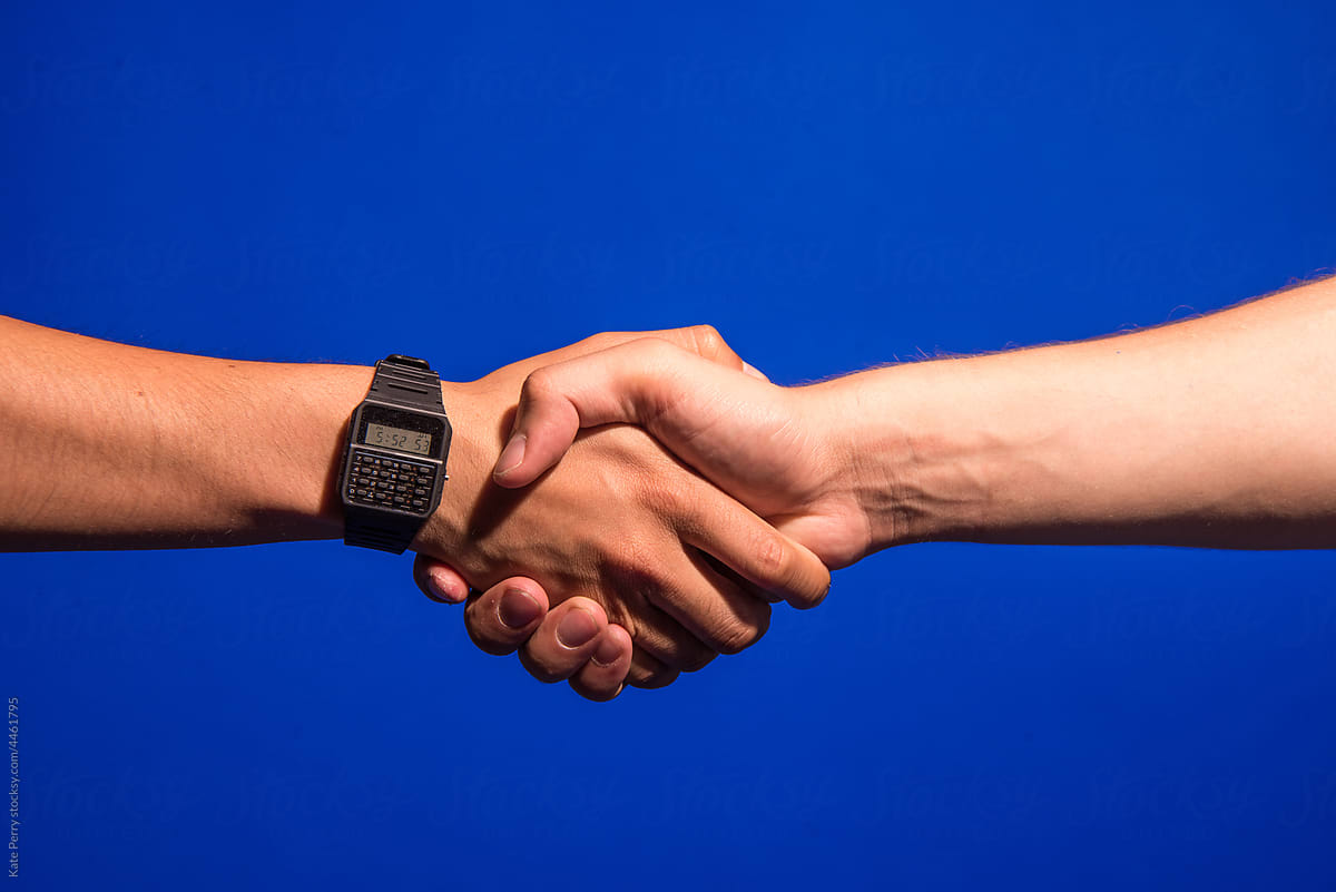 "Hand Shake" by Stocksy Contributor "Katelyn Perry" - Stocksy