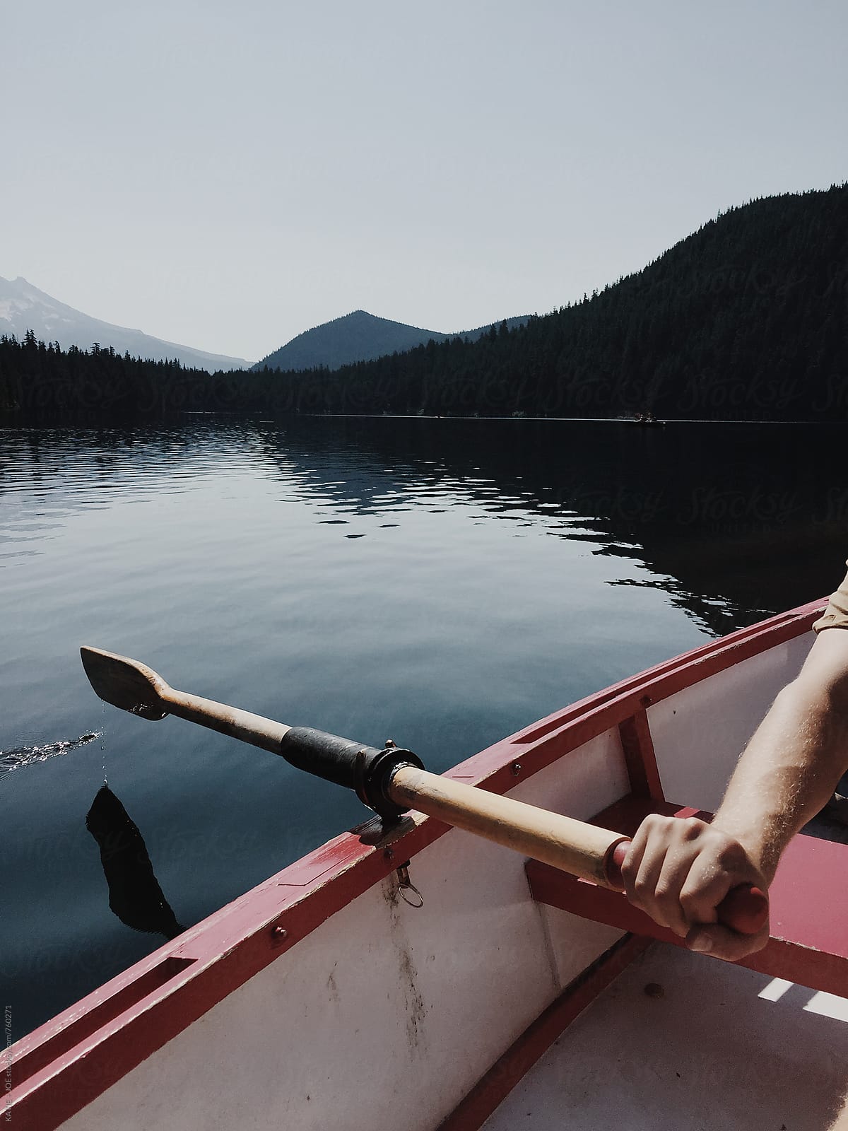"Row Boat On A Lake With A Mountain View" by Stocksy Contributor "KATIE ...