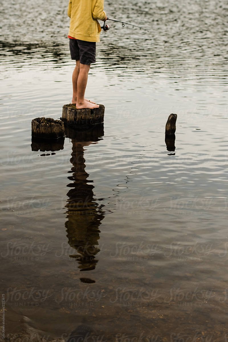 "Legs Of Boy Fishing On A Lake" by Stocksy Contributor "Lea Jones ...