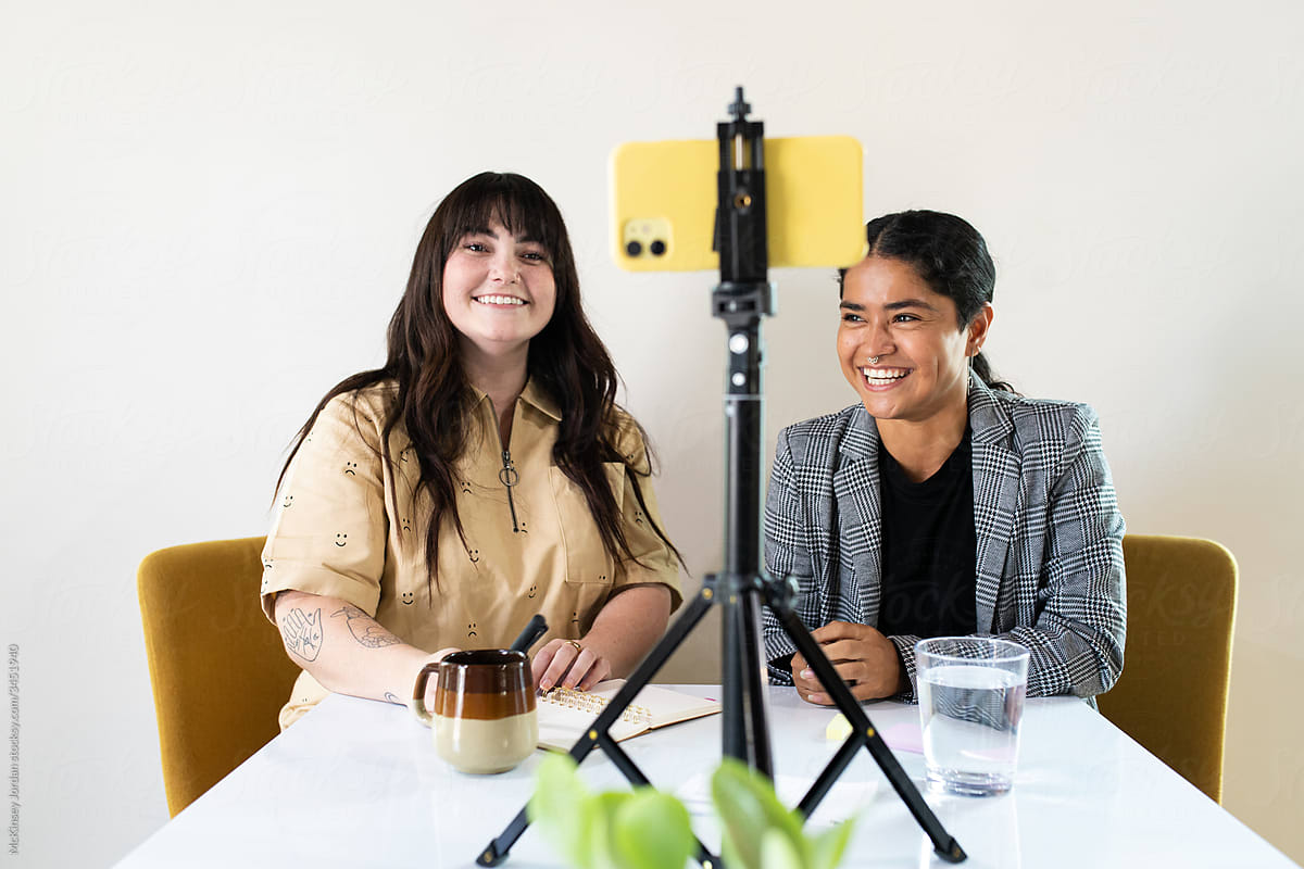 "Female Co Workers Smile On A Video Call" by Stocksy Contributor ...