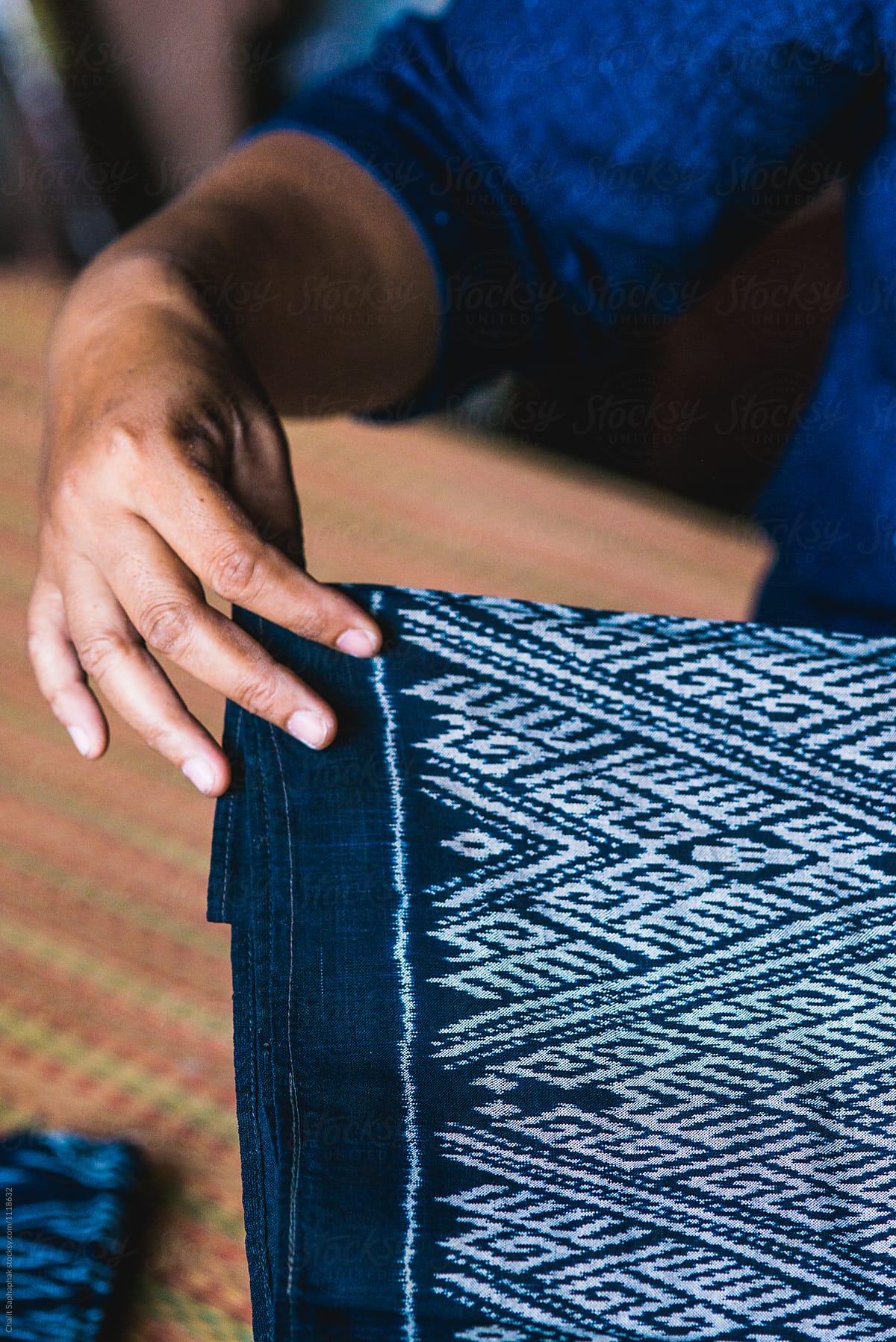 "Traditional Indigo Fabrics" by Stocksy Contributor "Chalit Saphaphak ...