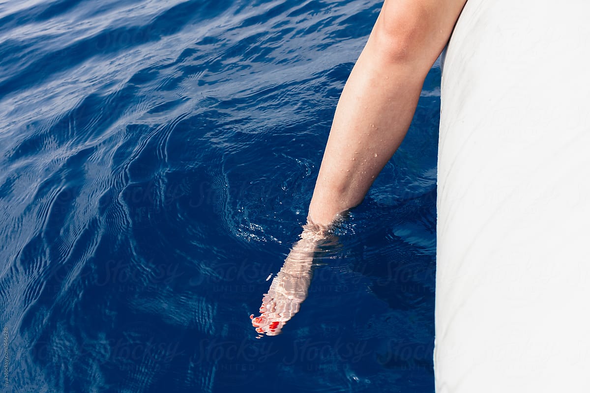 "Young Woman Leg In Sea Water, Sailing On A Boat" by Stocksy ...