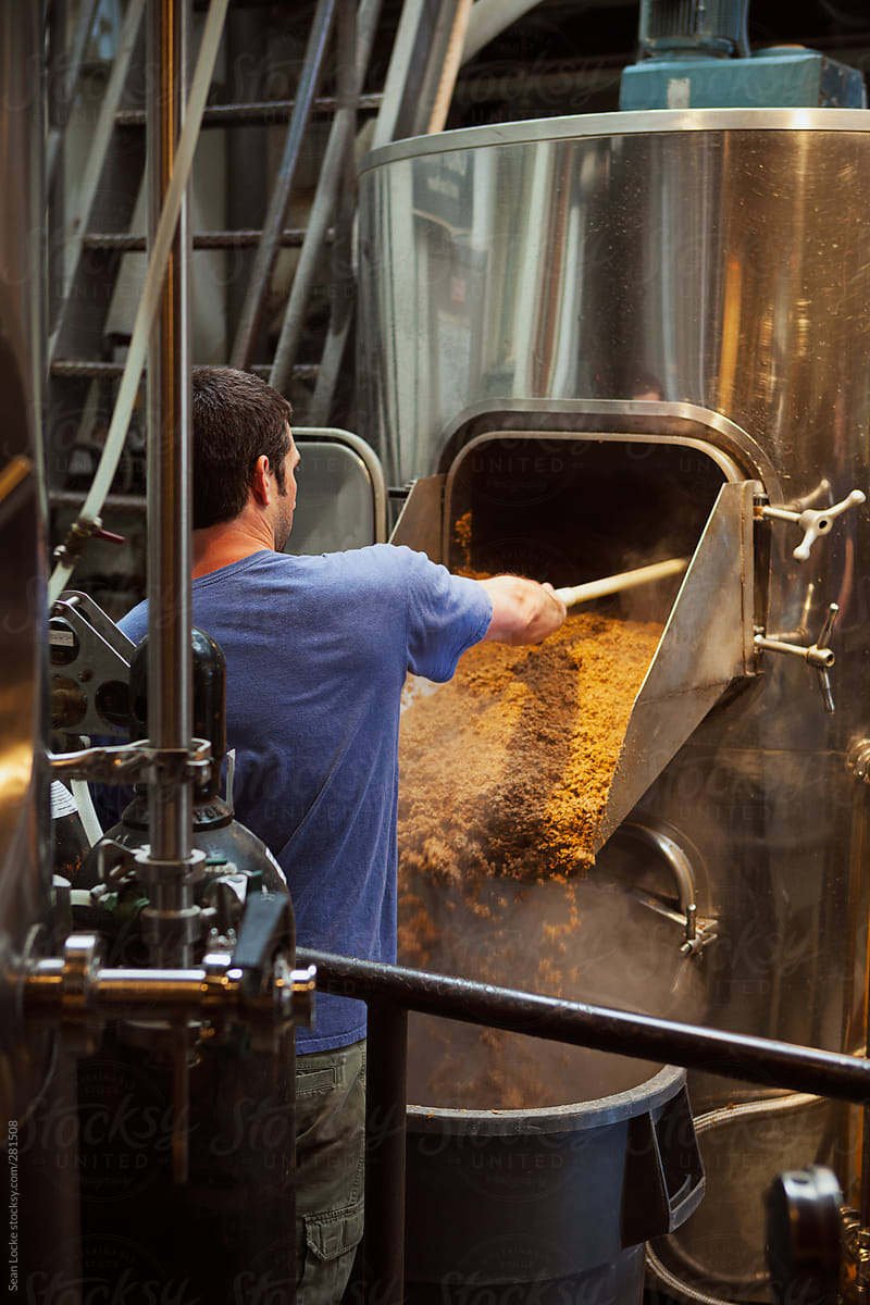 "Beer: Cleaning Used Grain From Mash Tun" by Stocksy Contributor "Sean ...