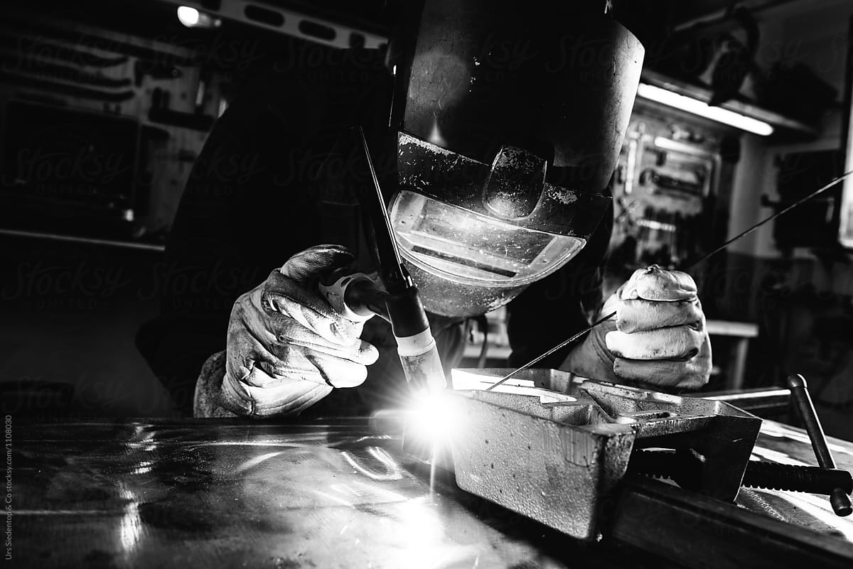"Black And White Image Of Welder" by Stocksy Contributor "Urs Siedentop ...