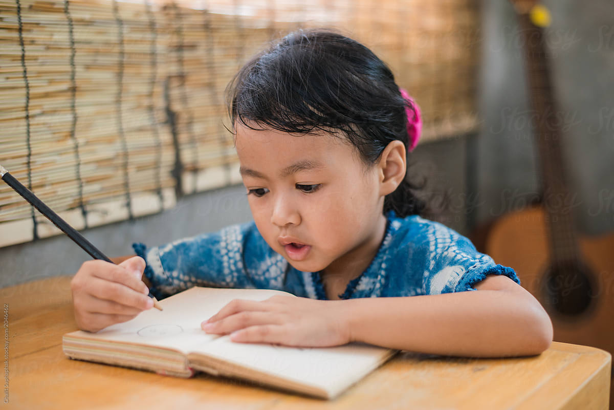 "Asian Children Drawing" by Stocksy Contributor "Chalit Saphaphak ...
