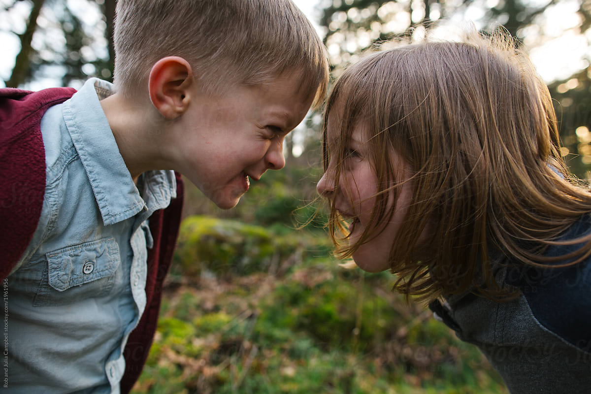 "Two Boys Goofing Around Together Outside" by Stocksy Contributor "Rob ...