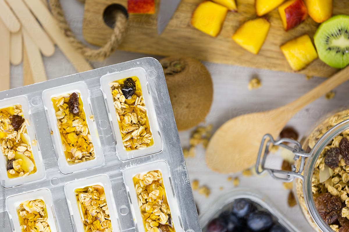 "Yogurt Granola Parfait Ice Lollies In Mould" by Stocksy Contributor ...