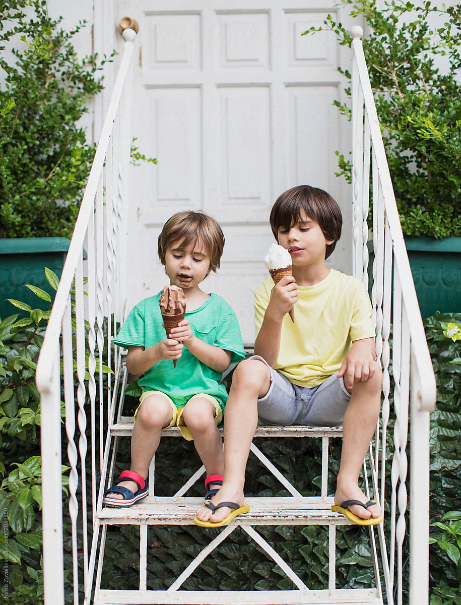 "Kids Holding Ice Cream" by Stocksy Contributor "Nasos Zovoilis" - Stocksy