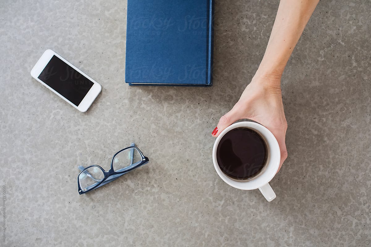 "Female Hand Taking A Cup Of Coffee" by Stocksy Contributor "Michela ...
