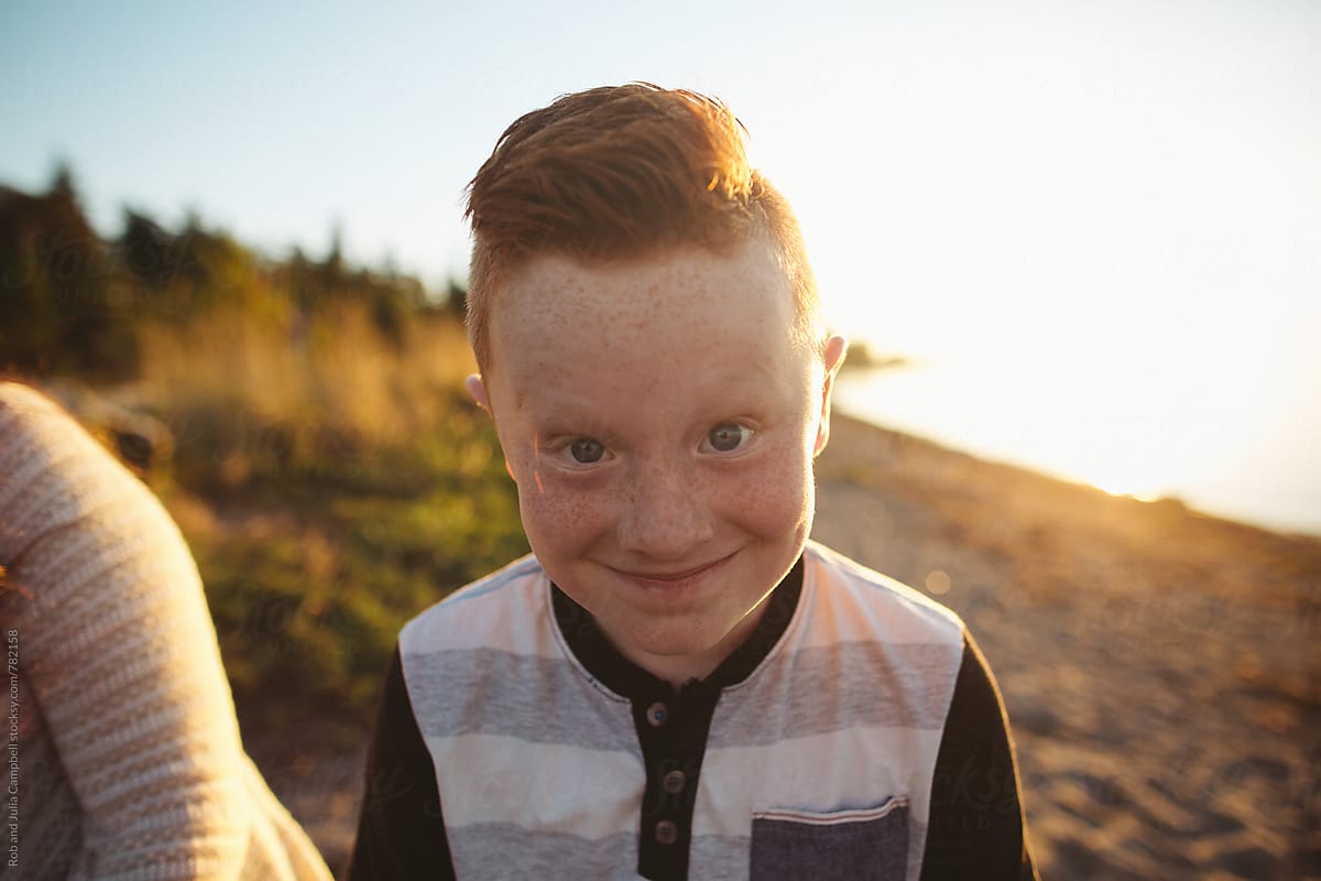 "Funny Freckled Boy Making Face Toward Camera" by Stocksy Contributor ...