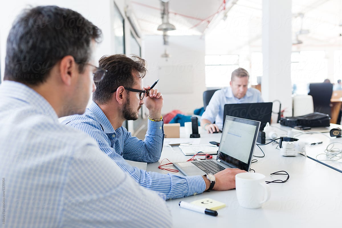 "Three Men Hard At Work" by Stocksy Contributor "Hillary Fox" - Stocksy