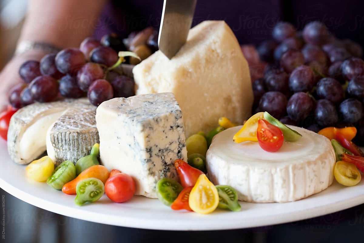 "Party Cheese Platter" by Stocksy Contributor "Jill Chen" - Stocksy