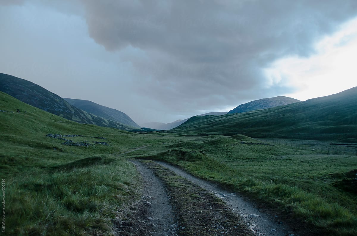 "Storm Over The Valley" by Stocksy Contributor "Neil Warburton" - Stocksy