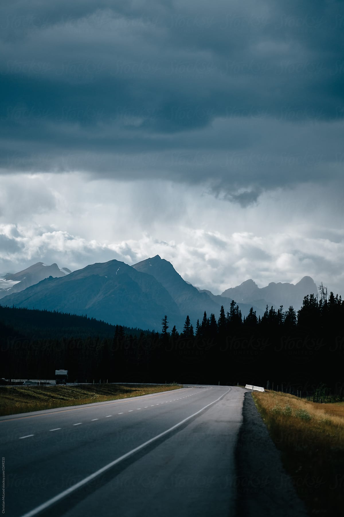 "Rain Storm Approaches Over The Mountains In The Canadian Rockies" by ...
