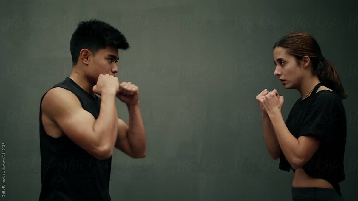 "Coach Teaching Girl Self-defense" by Stocksy Contributor "Guille ...