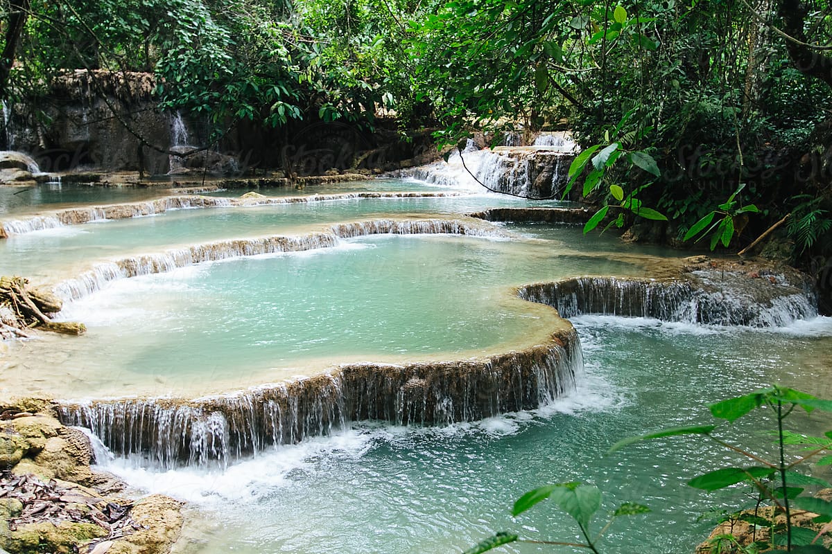 "Waterfall In Laos" by Stocksy Contributor "Cameron Zegers" - Stocksy