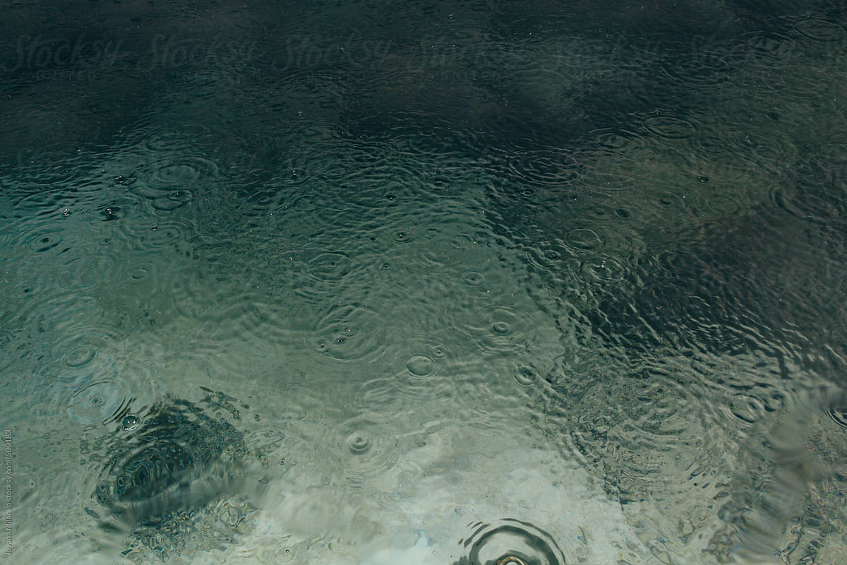 "Rain Over The Coral Sea Surface" by Stocksy Contributor "Jovana ...