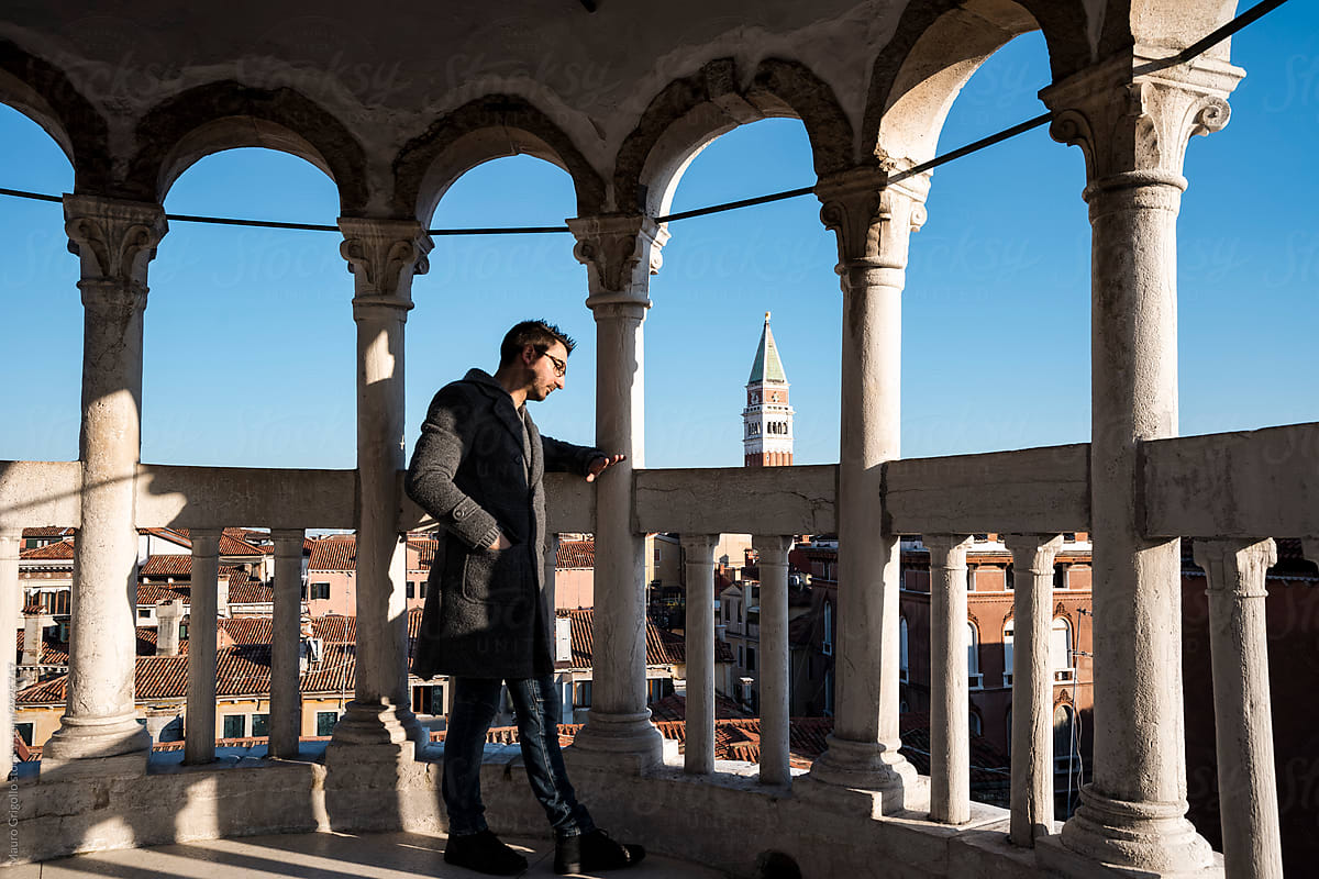 "Man Visiting Venice, Italy" by Stocksy Contributor "Mauro Grigollo ...