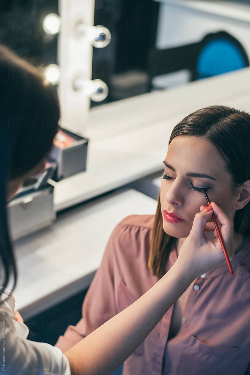 "Woman At Professional Makeup Artist's Salon Doing Makeup" by Stocksy ...