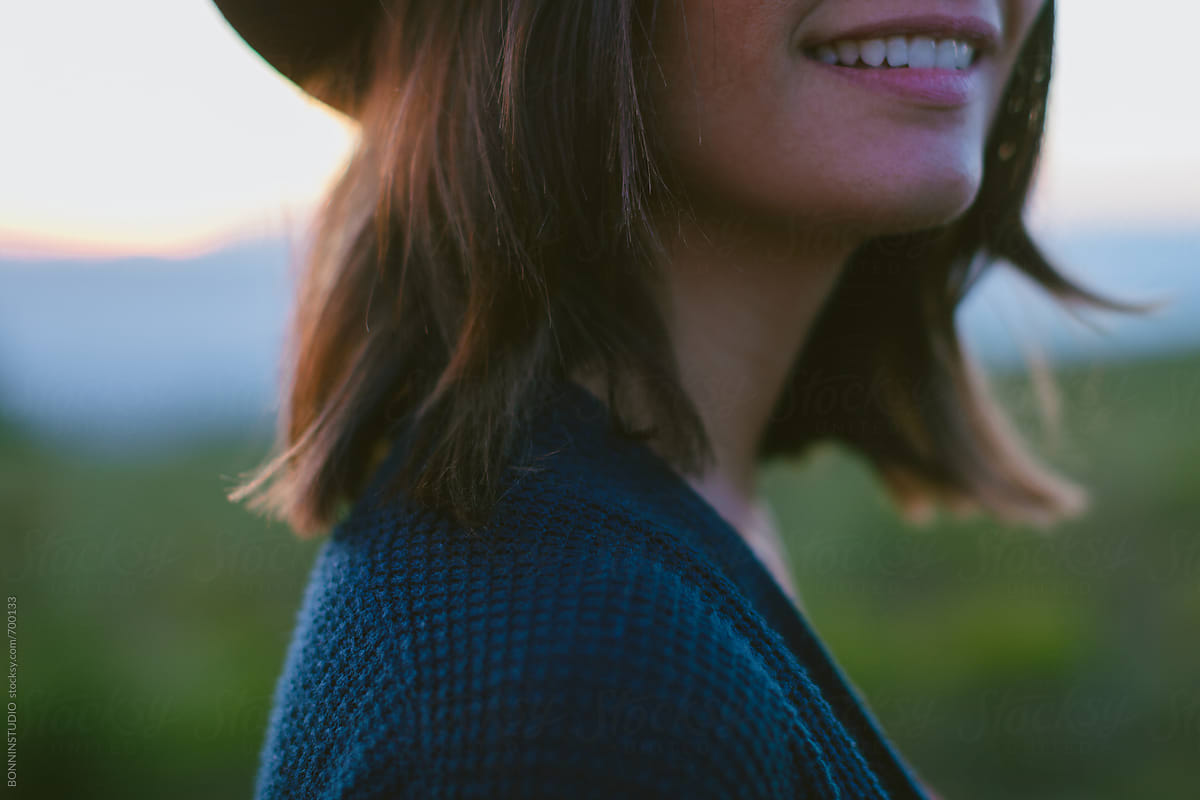 "Closeup Of A Young Woman Smiling Outside." by Stocksy Contributor ...