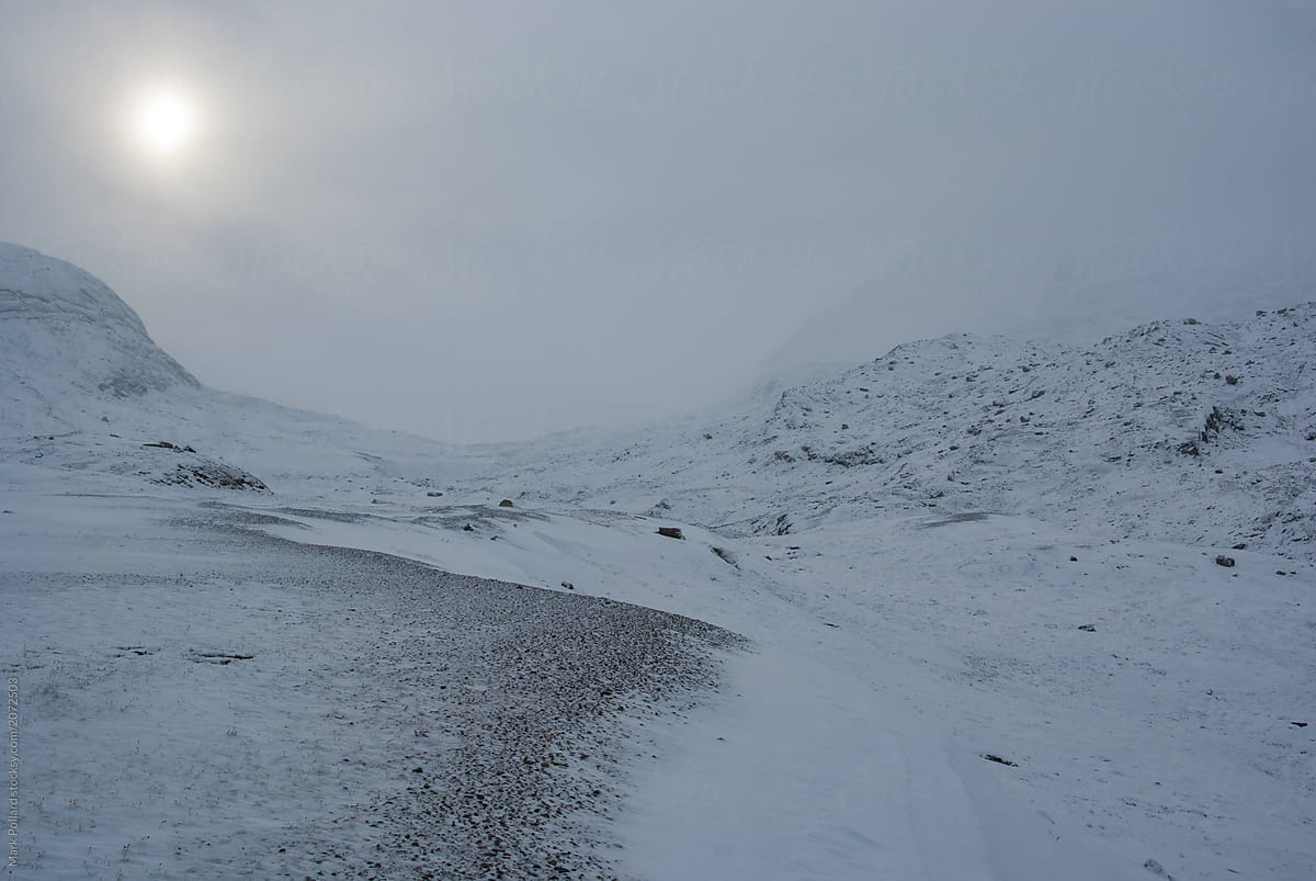 "Winter Sun Shines Weakly Through Storm" by Stocksy Contributor "Mark ...