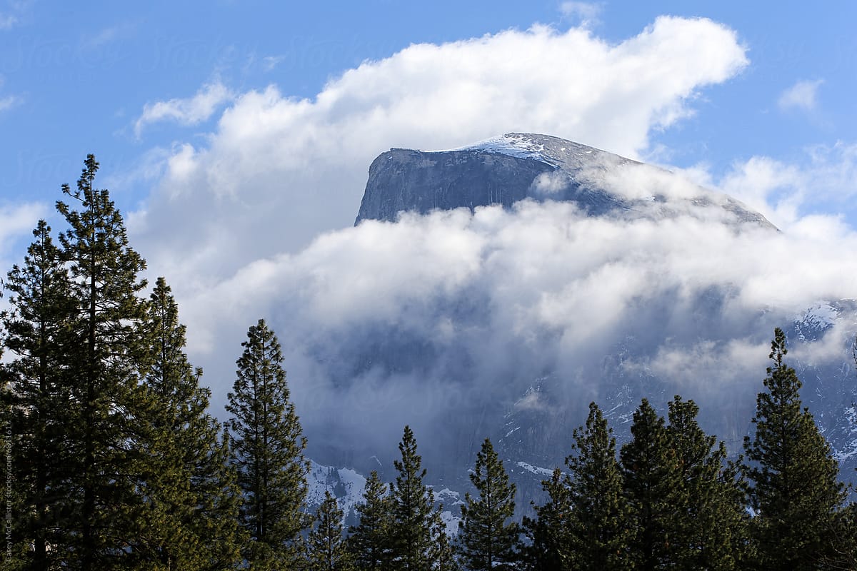 "Half Dome Fog" by Stocksy Contributor "Casey McCallister" - Stocksy