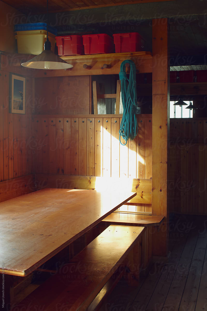 "Mountain Hut Inside" by Stocksy Contributor "Miquel Llonch" - Stocksy
