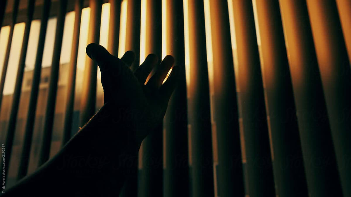 "Hand Covering The Sun In A Room" by Stocksy Contributor "THAIS VARELA ...