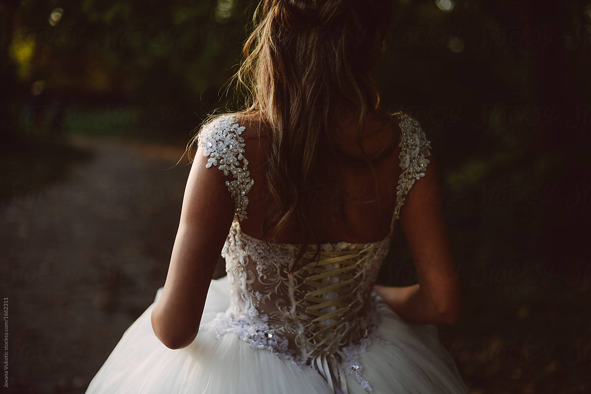 "Bride From The Back" by Stocksy Contributor "Jovana Vukotic" - Stocksy