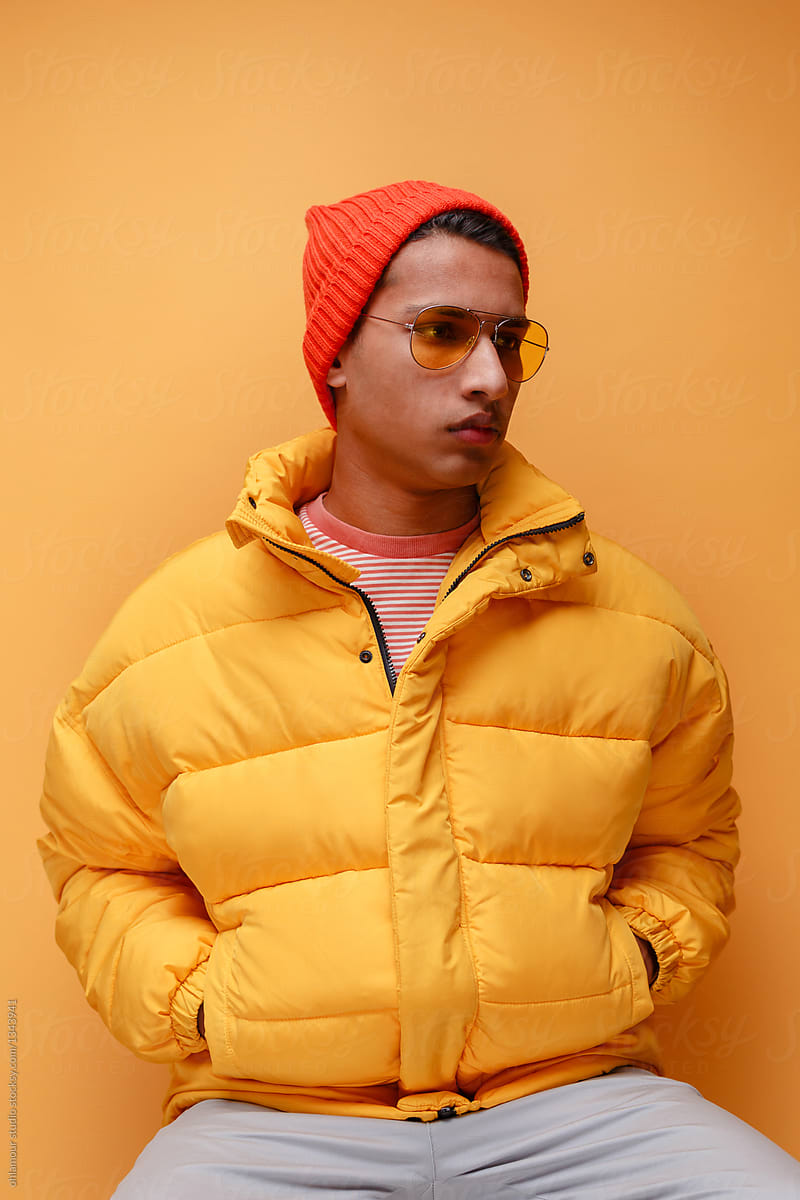 "Young Man Portraits In Orange" by Stocksy Contributor "Leandro Crespi ...