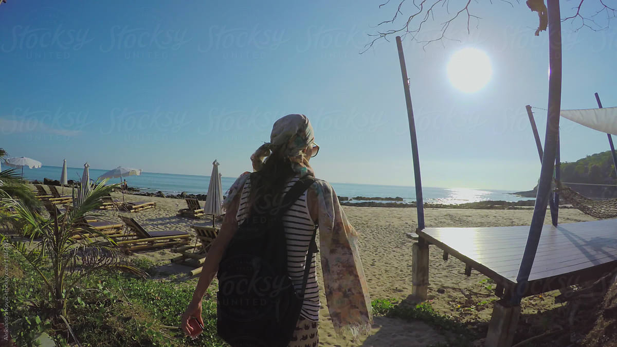 "Woman Arrives At The Beach" by Stocksy Contributor "Alexandra Bergam ...