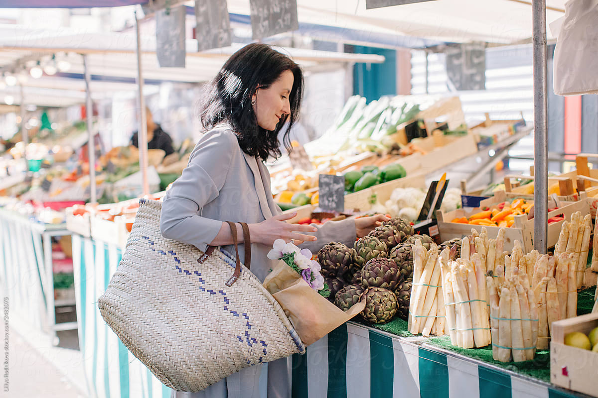 "Brunette Woman Shopping At Street Market" by Stocksy Contributor ...