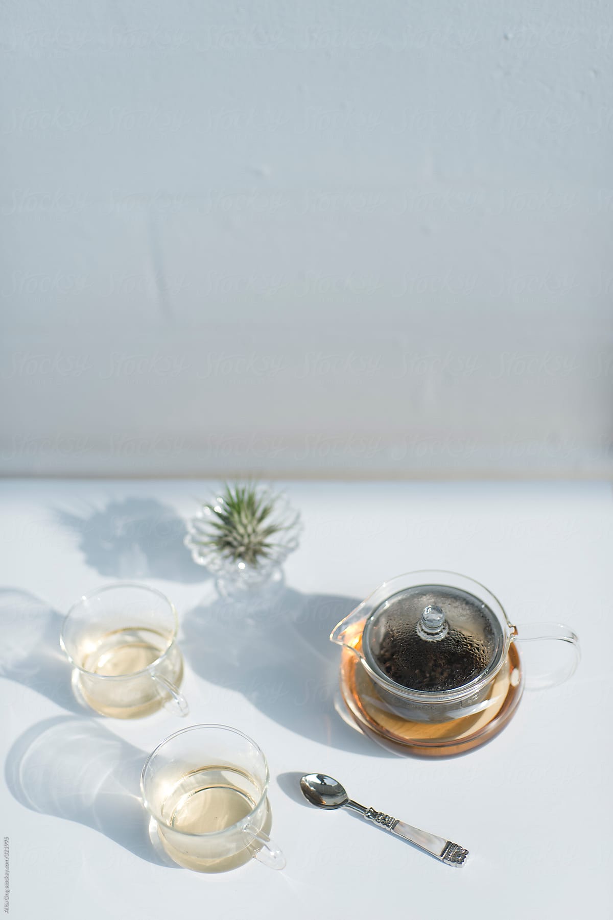 "Teapot And Tea Cups On White Table" by Stocksy Contributor "Alita ...