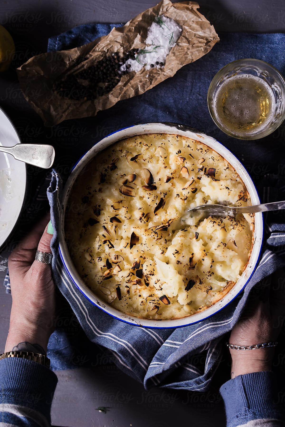 "Woman's Hands Serving A Fish Pie Onto A Table." by Stocksy Contributor ...