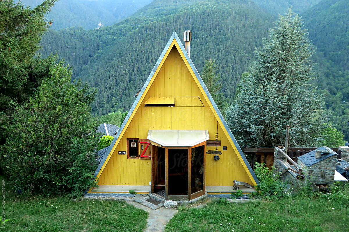 "Yellow House In The Mountains" by Stocksy Contributor "Bisual Studio ...