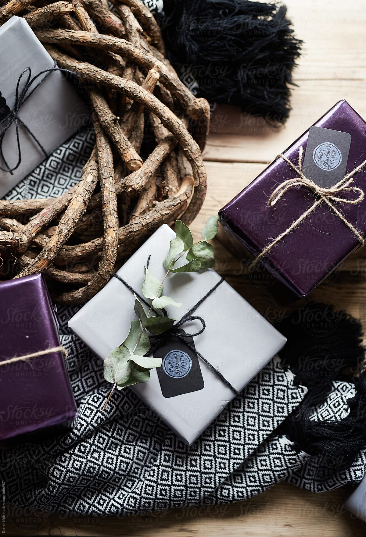 "Christmas Gifts." by Stocksy Contributor "Darren Muir" - Stocksy
